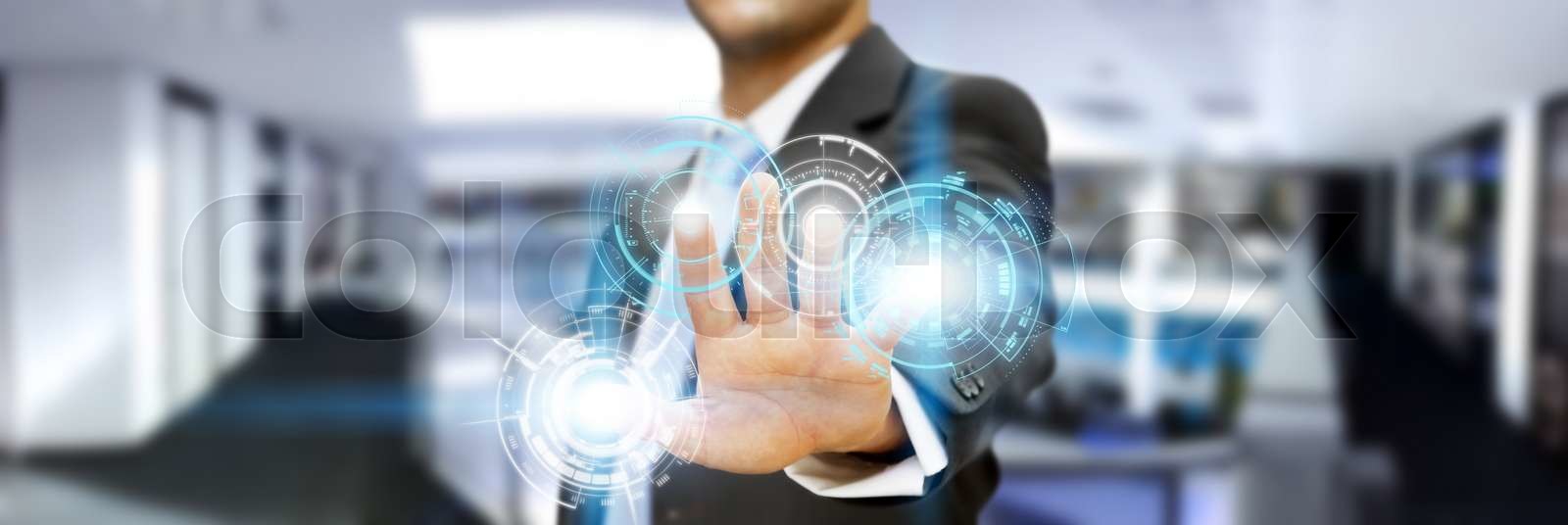 Businessman in his office using tactile interface | Stock image | Colourbox