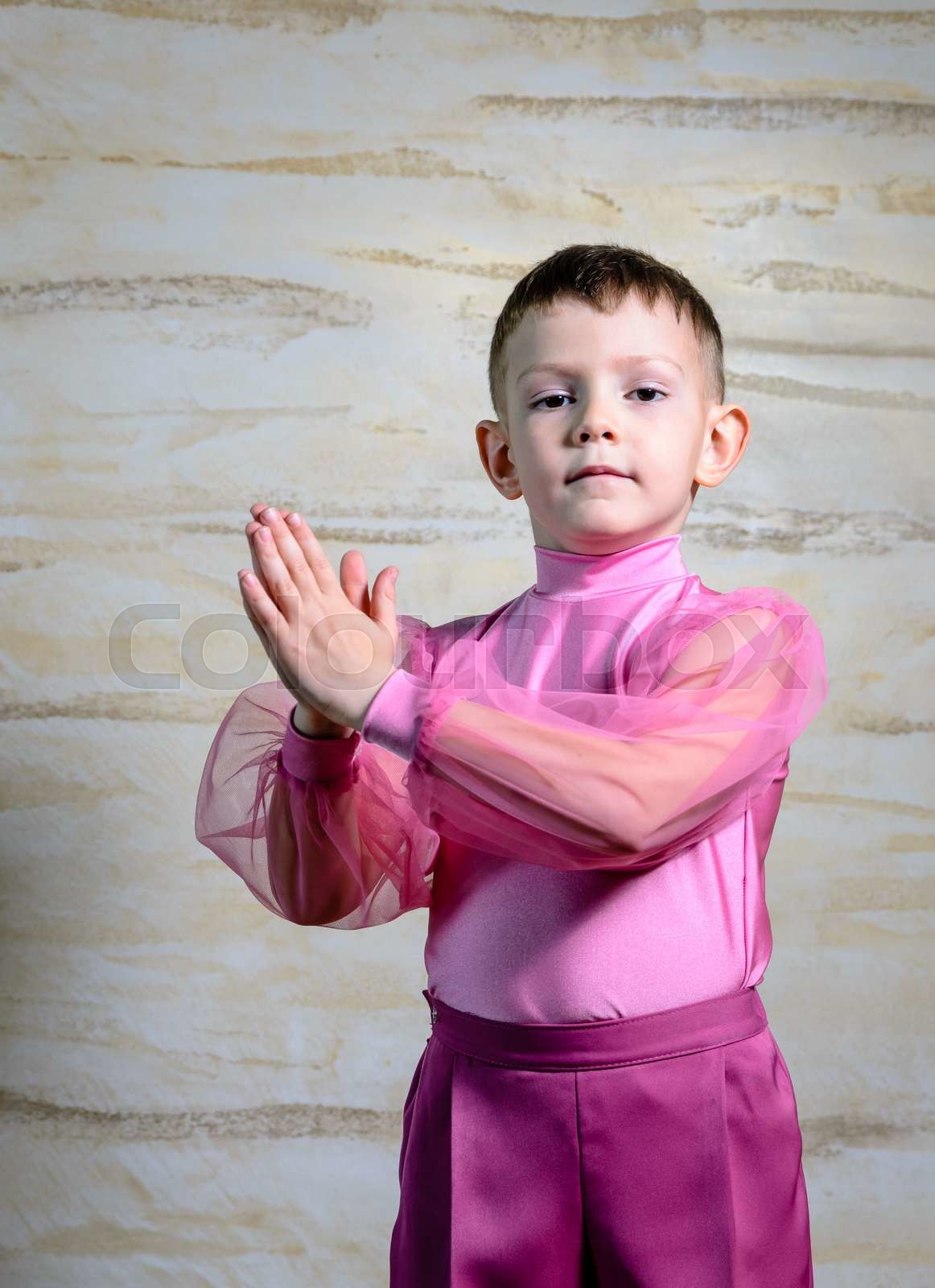 Boy Dancer Posing with Hands Together | Stock image | Colourbox