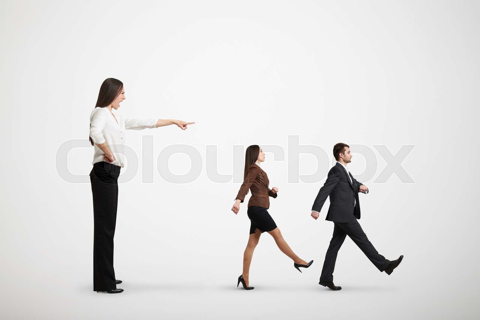 woman commanding her subordinates | Stock image | Colourbox
