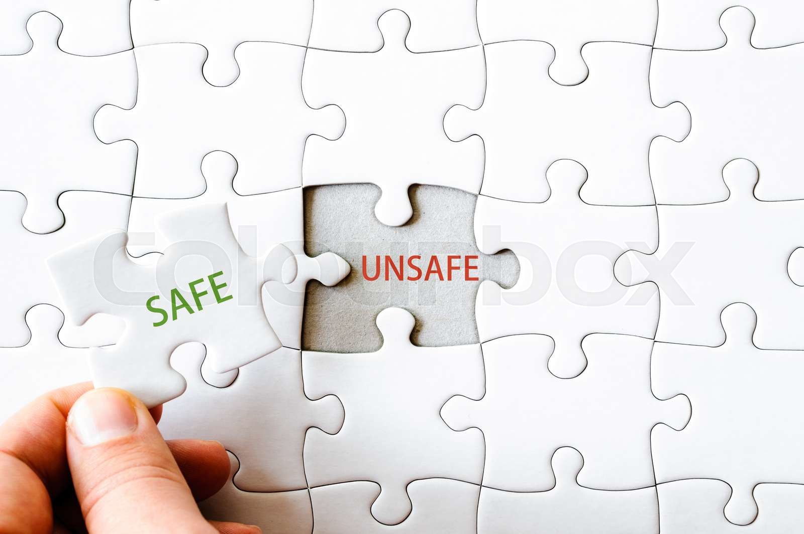 Missing jigsaw puzzle piece with word SAFE | Stock image | Colourbox