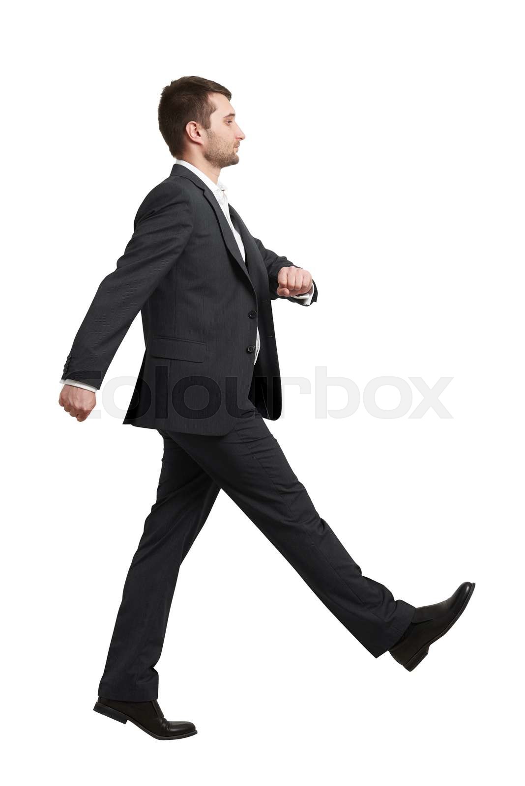 man in formal wear walking | Stock image | Colourbox