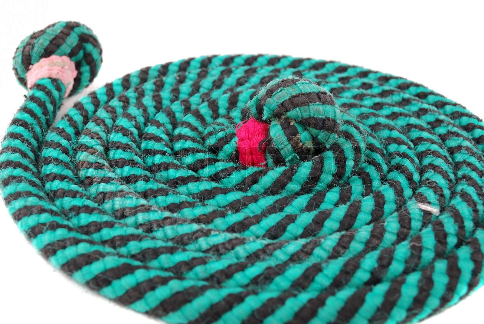 Cord twirled by a spiral with knots on the ends | Stock image | Colourbox