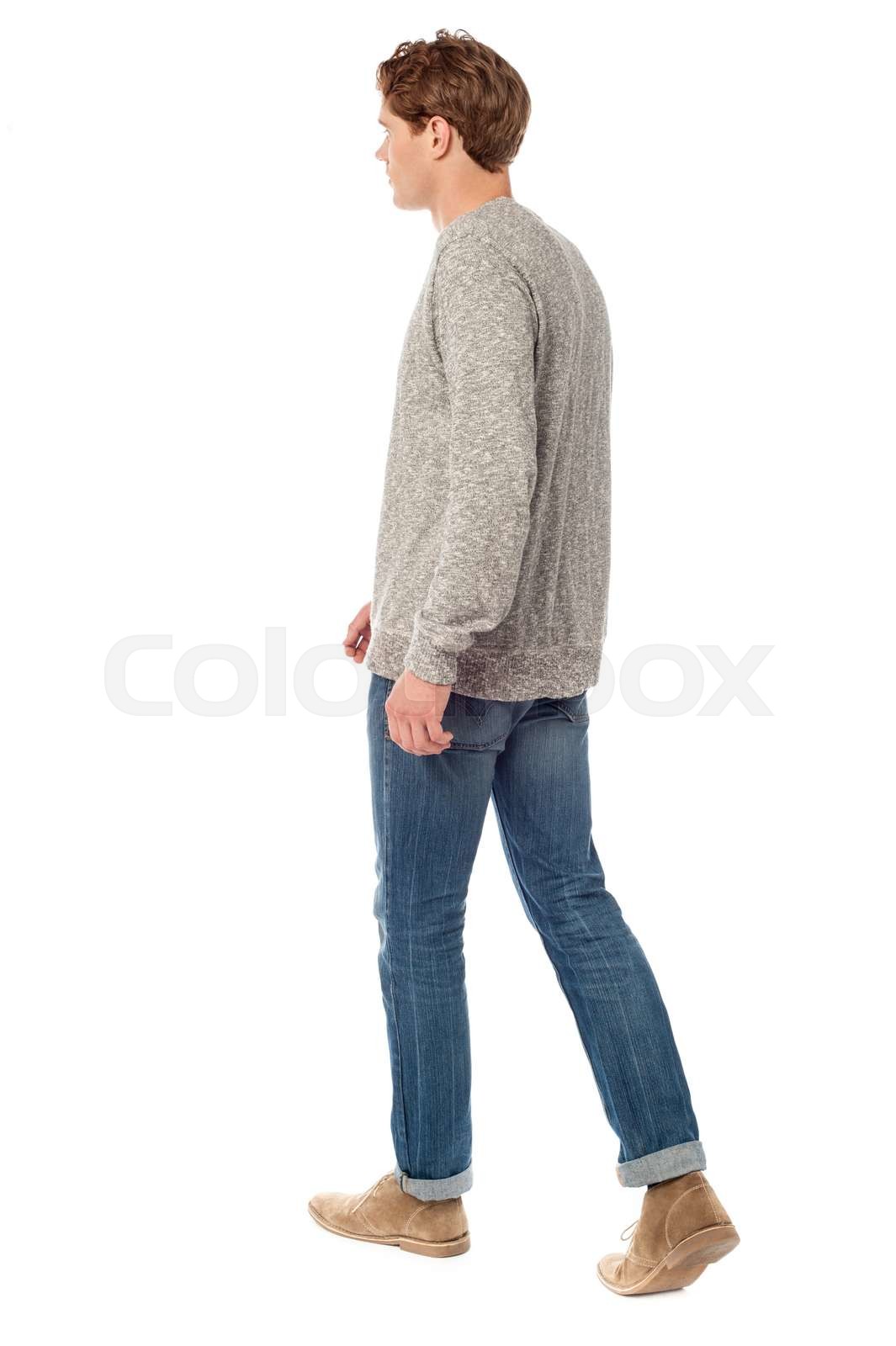 Walking young man from back. | Stock image | Colourbox