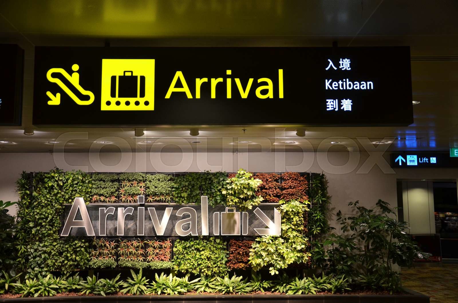 Directional sign in the Singapore Changi Airport. | Stock image | Colourbox