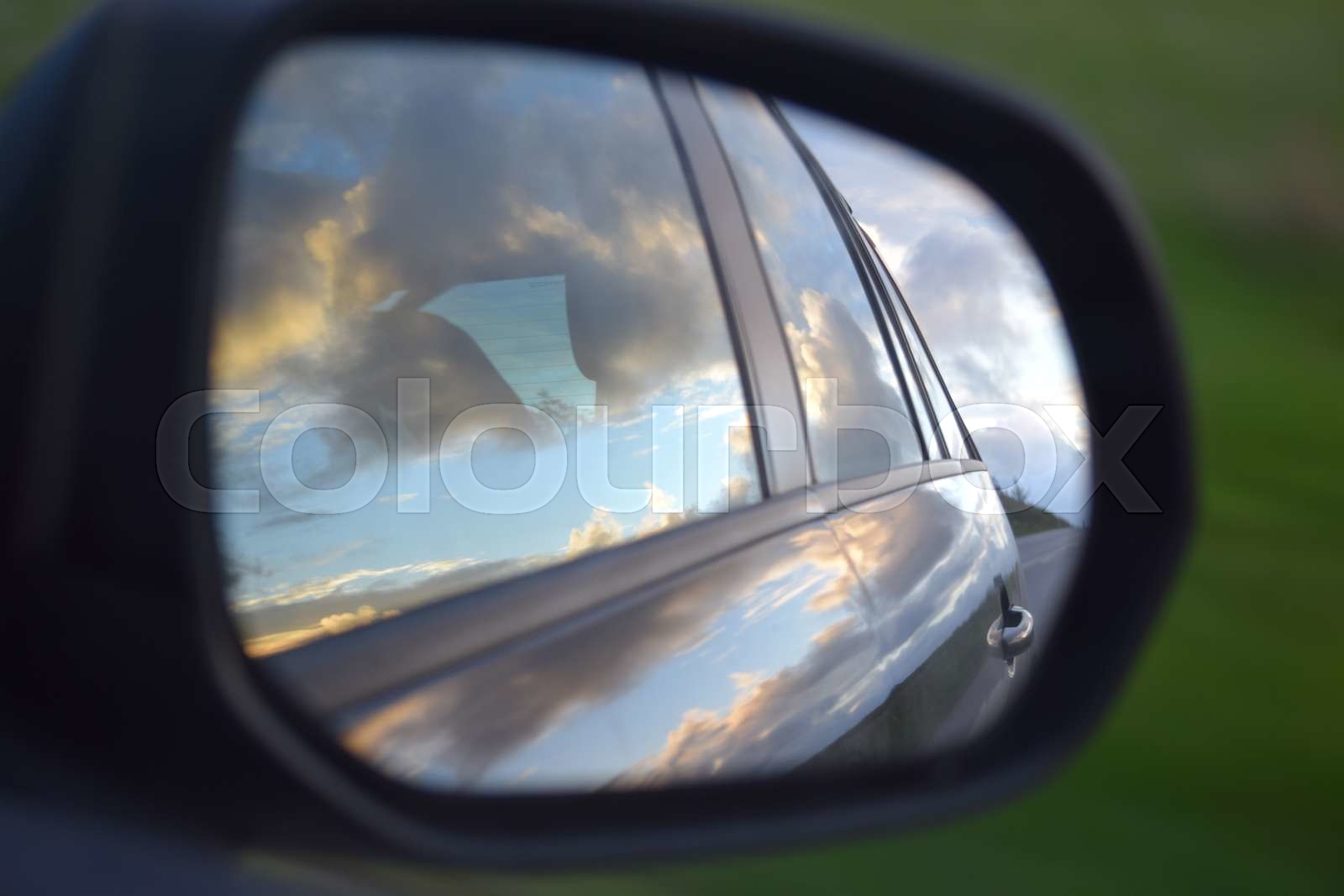 Reflection in car mirror | Stock image | Colourbox