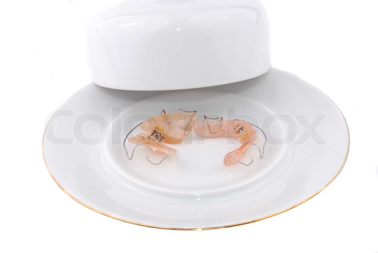 Tooth plates for alignment of a teeth on a white background | Stock ...