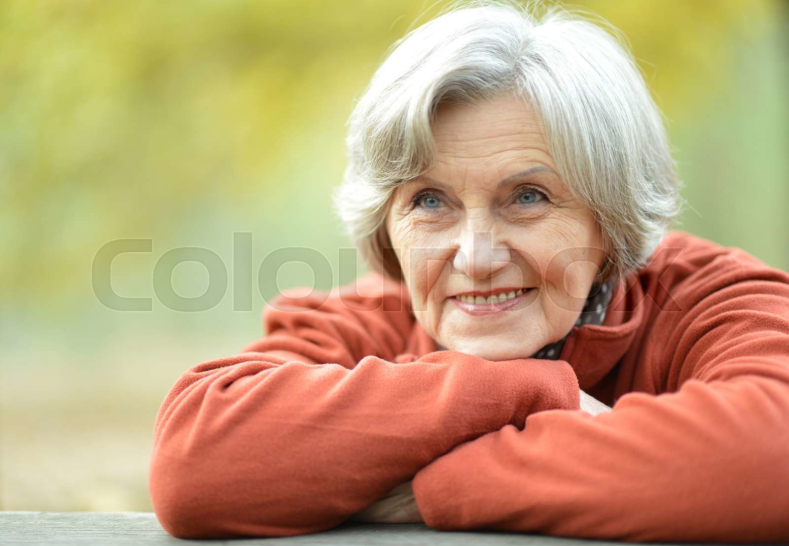 happy old woman posing at nature | Stock image | Colourbox