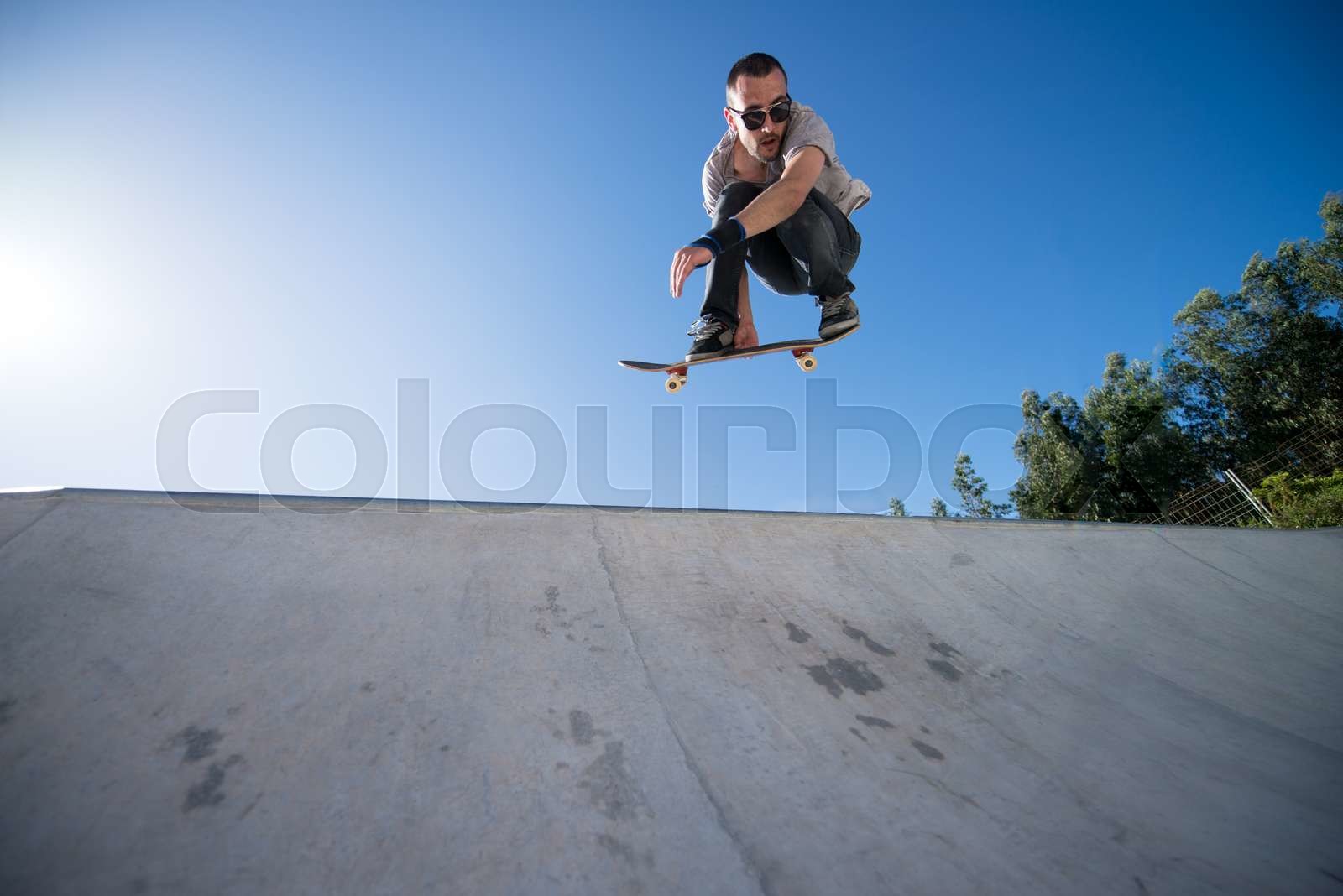 Skateboarder flying | Stock image | Colourbox