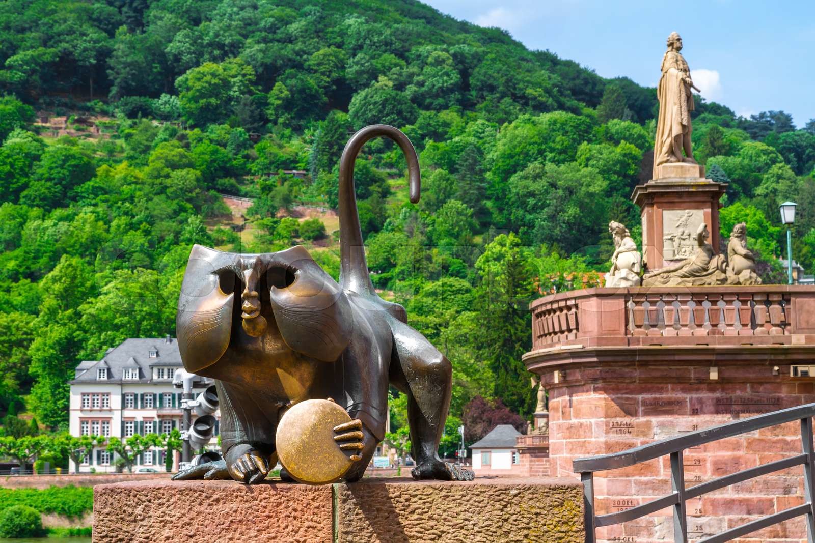 Bronze sculpture of a monkey on the old bridge. Heidelberg. Germany ...