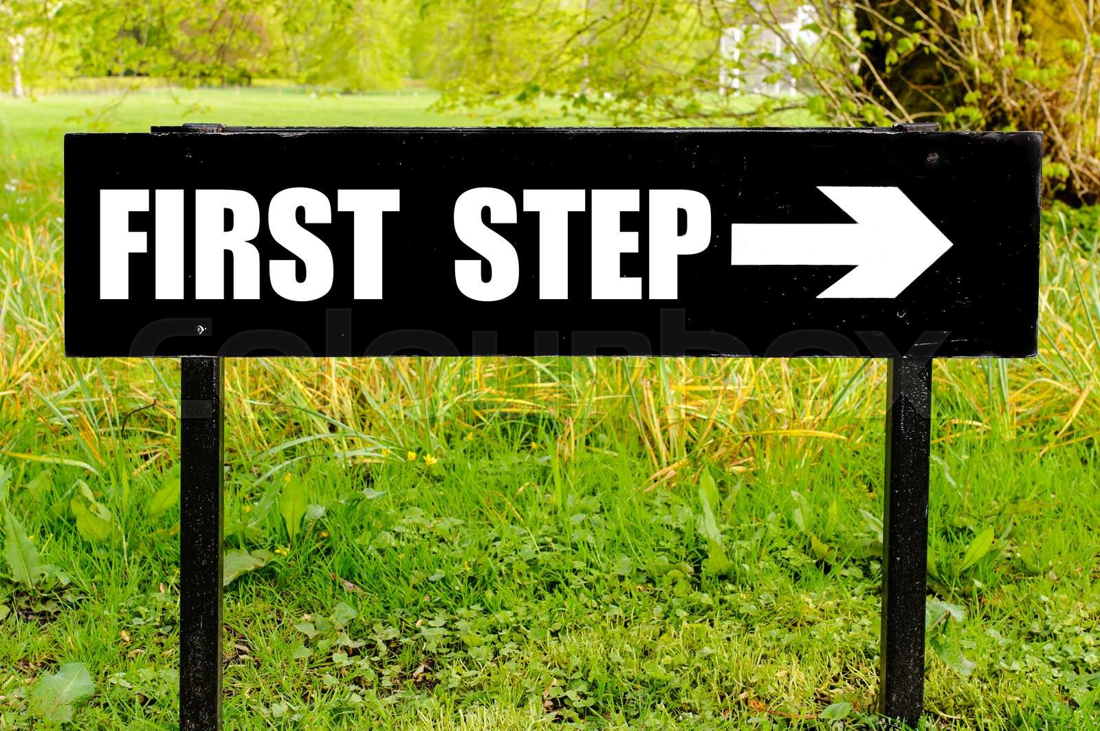 FIRST STEP written on directional black metal sign | Stock image ...