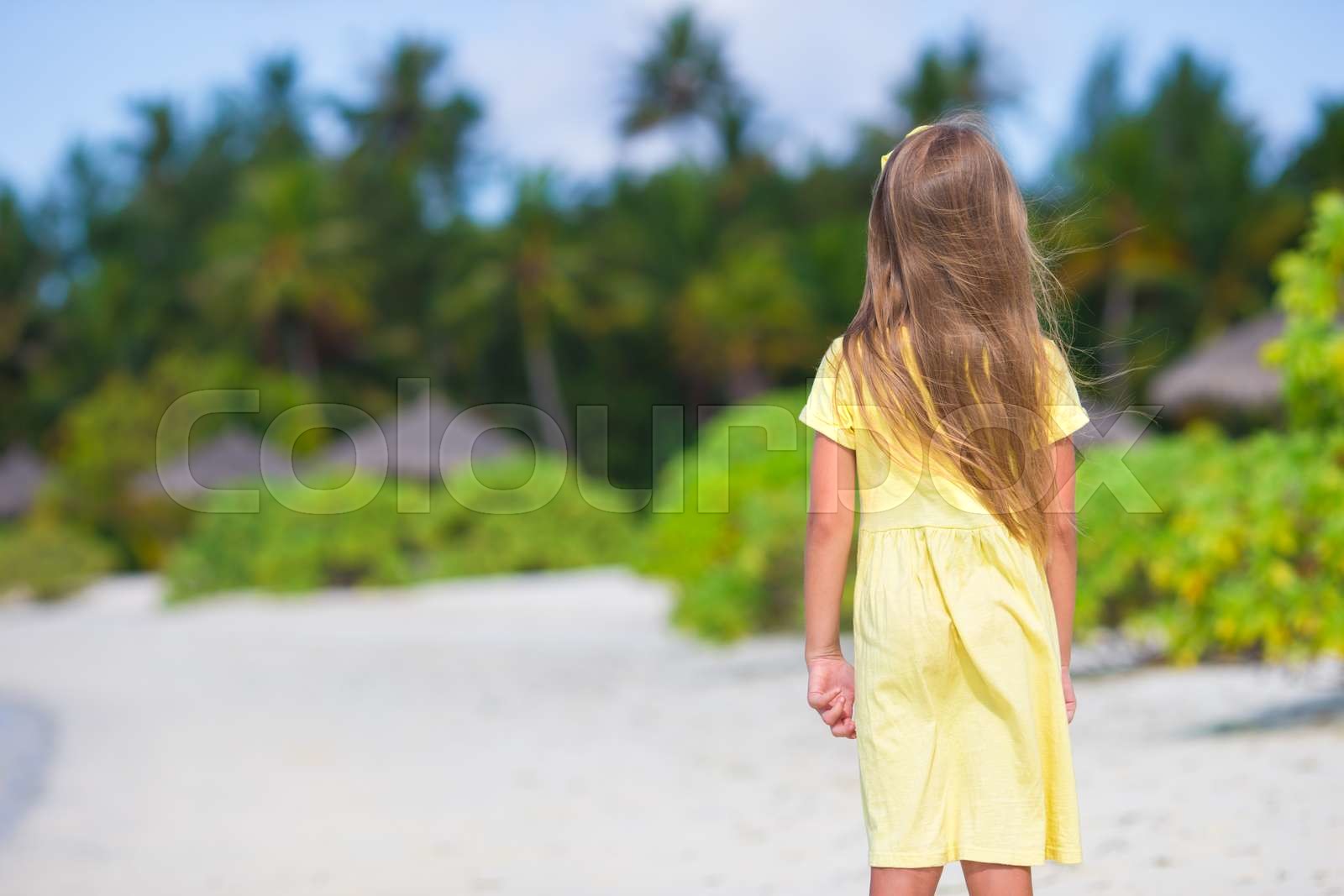 Adorable little girl at beach during summer vacation | Stock image ...