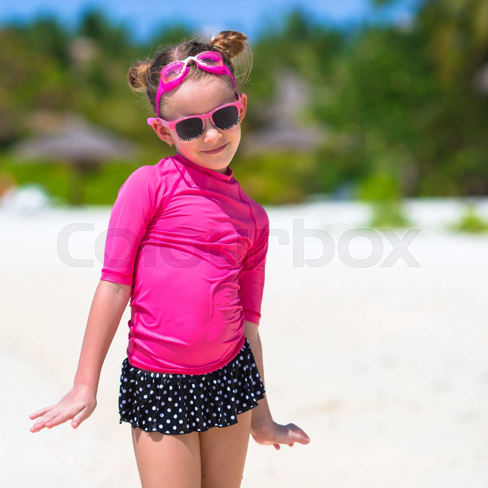 Adorable little girl at beach during summer vacation | Stock image ...