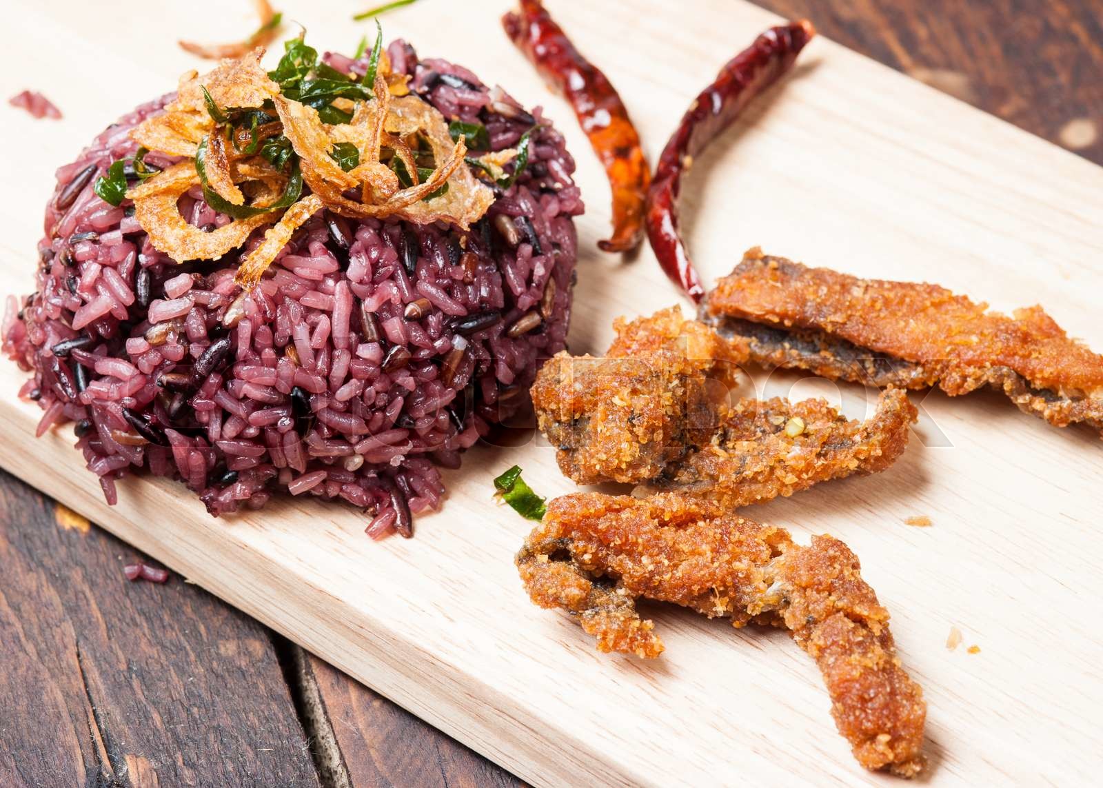 Fried fish and Brown rice in Thailand food | Stock image | Colourbox