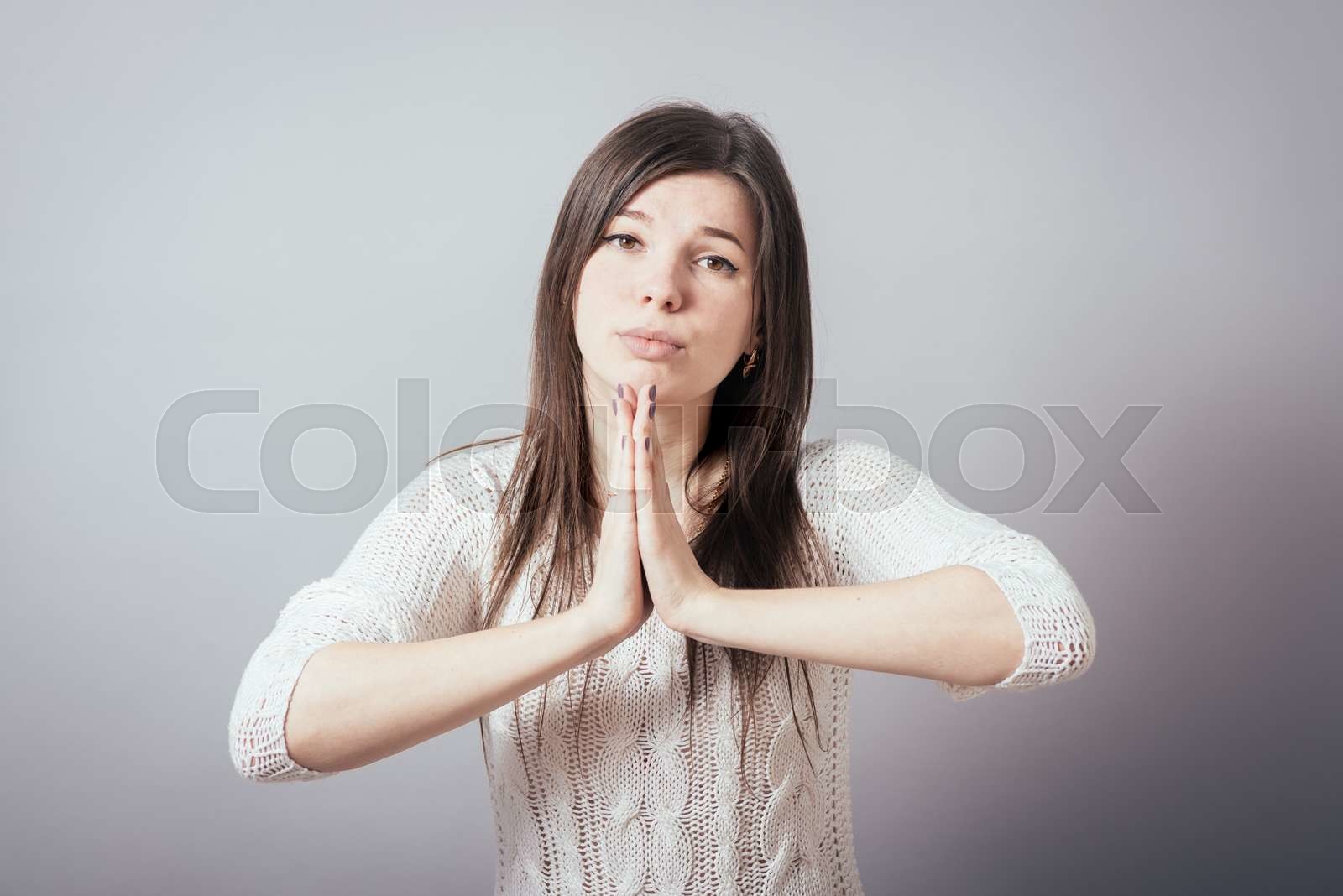 girl praying | Stock image | Colourbox