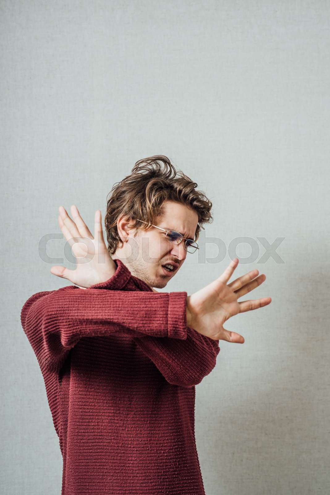 young man saying stop denial gesture | Stock image | Colourbox
