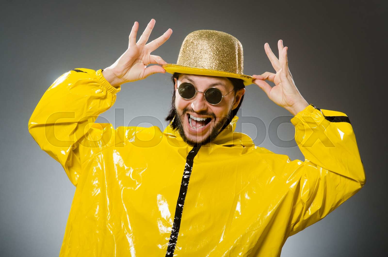 Man wearing yellow suit in funny concept | Stock image | Colourbox