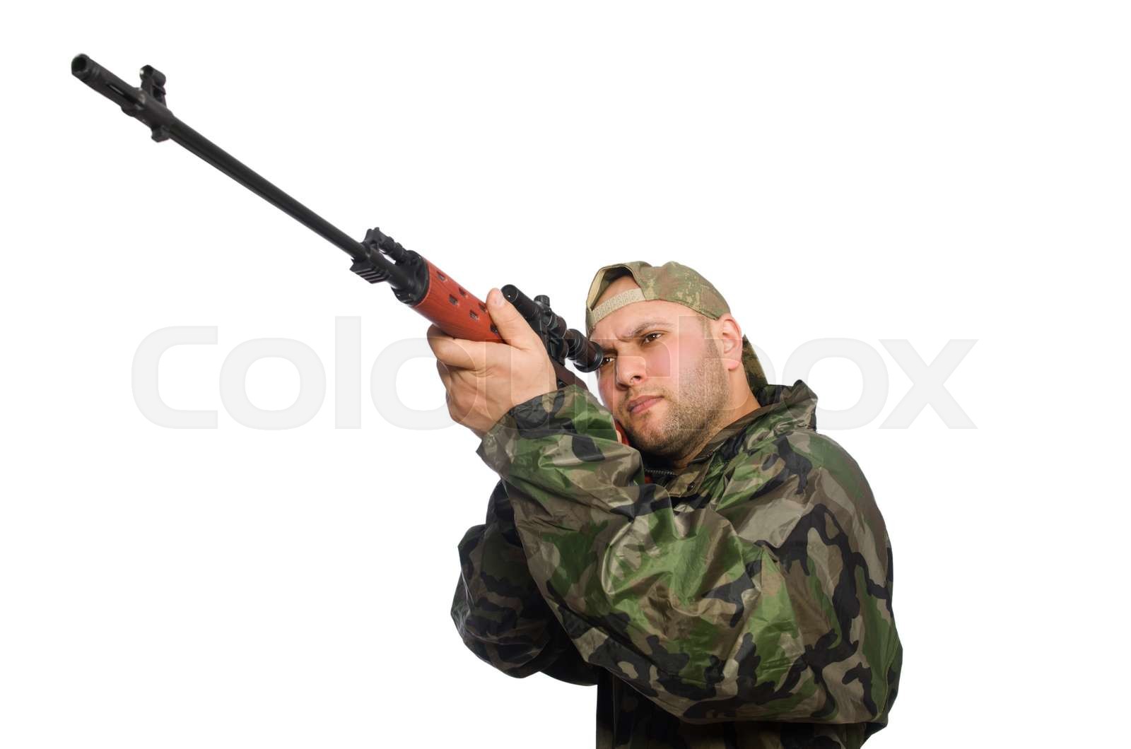 Solider holding gun isolated on white | Stock image | Colourbox