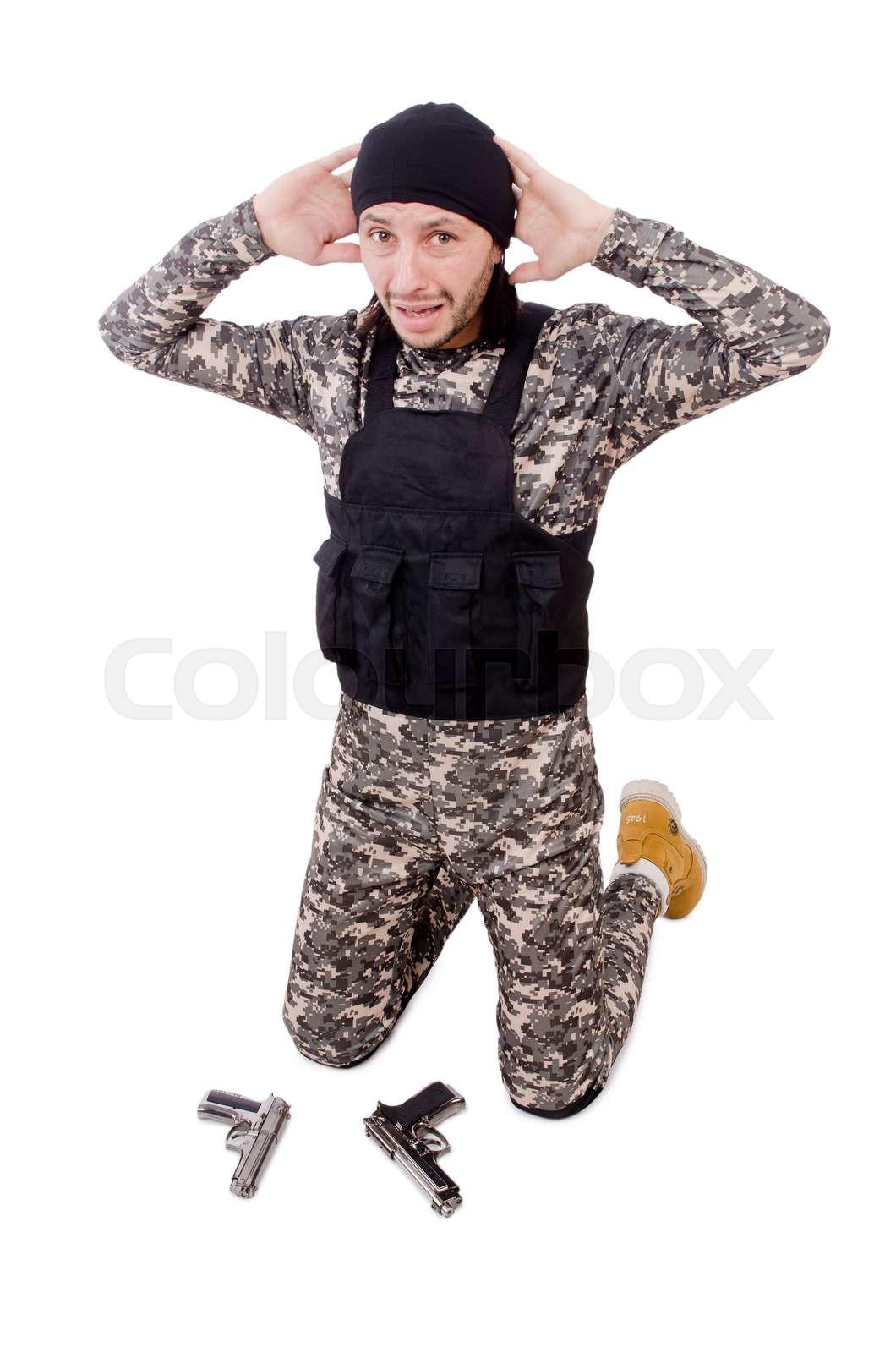 Surrendering man in military uniform holding gun isolated on white ...