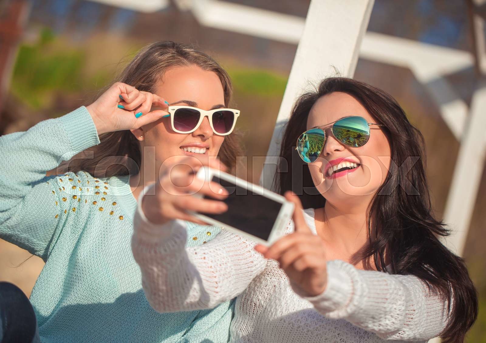 Two Girls Taking Selfie Stock Image Colourbox