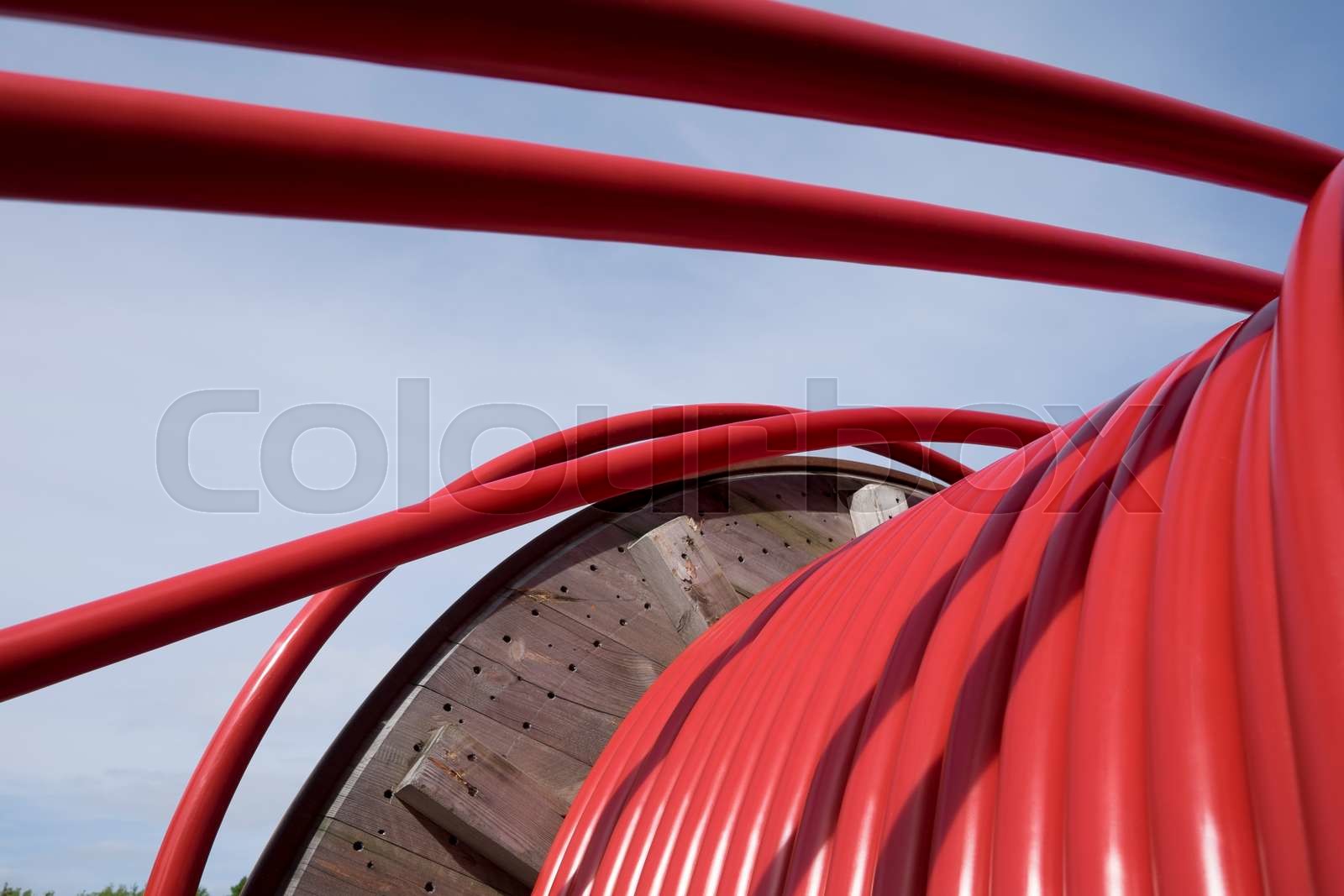 Coil of Red Electric Cable | Stock image | Colourbox
