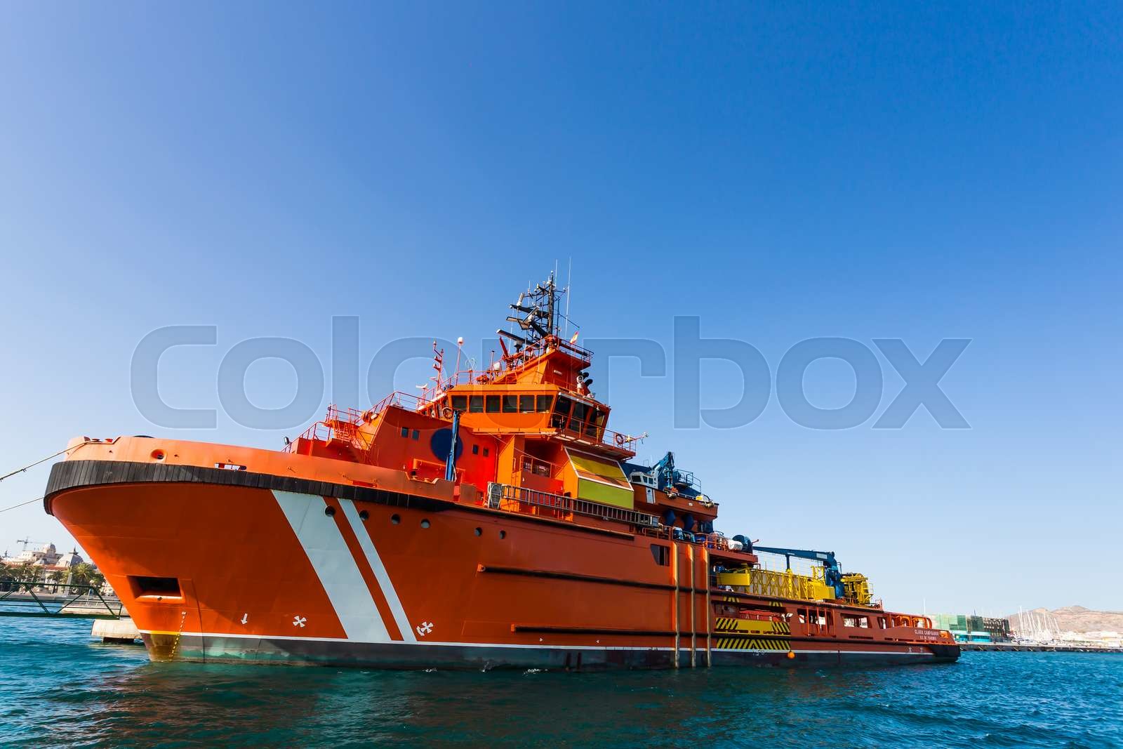 Large orange rescue ship in the seaport | Stock image | Colourbox