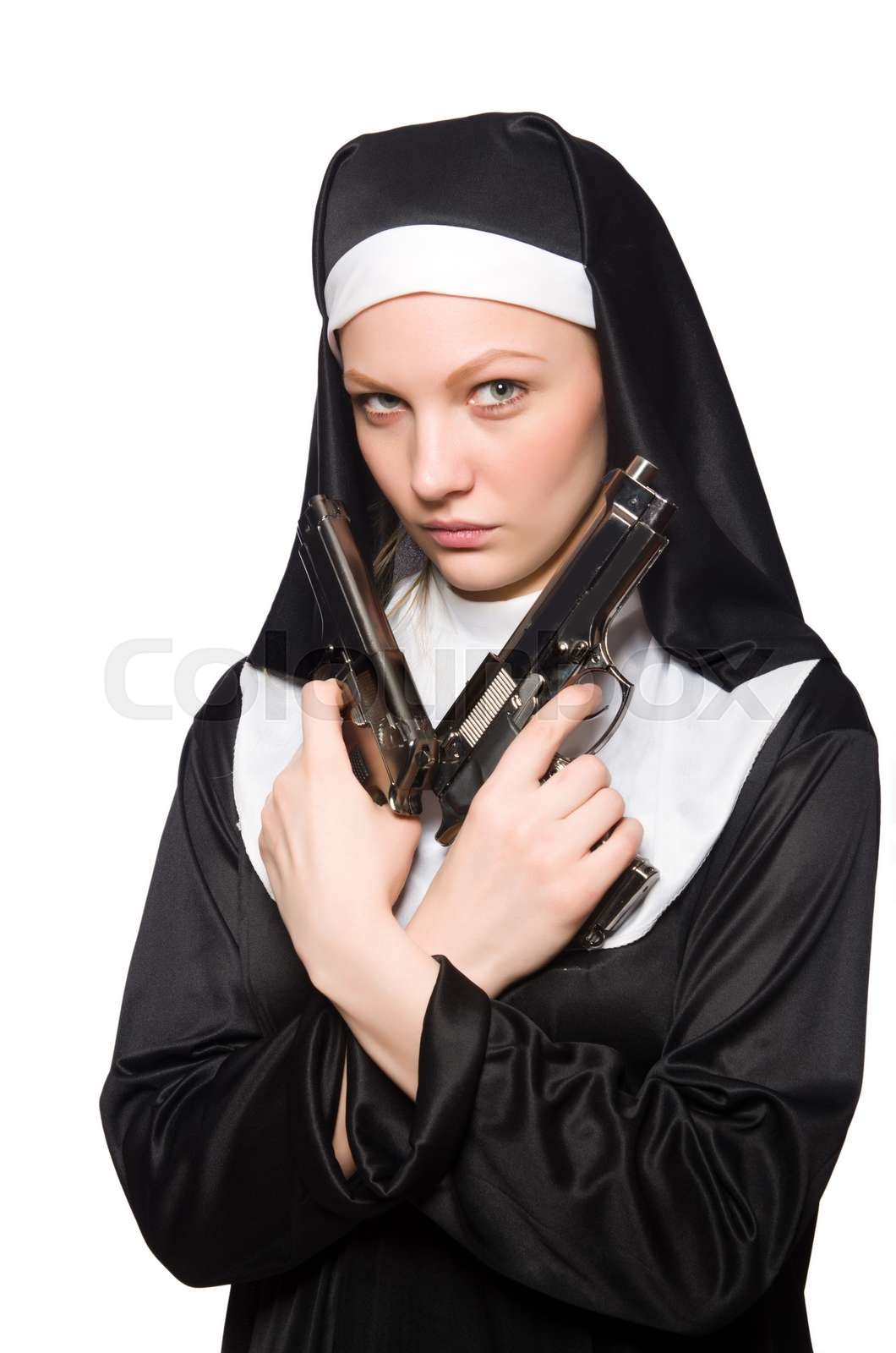 Nun with gun isolated on white | Stock image | Colourbox