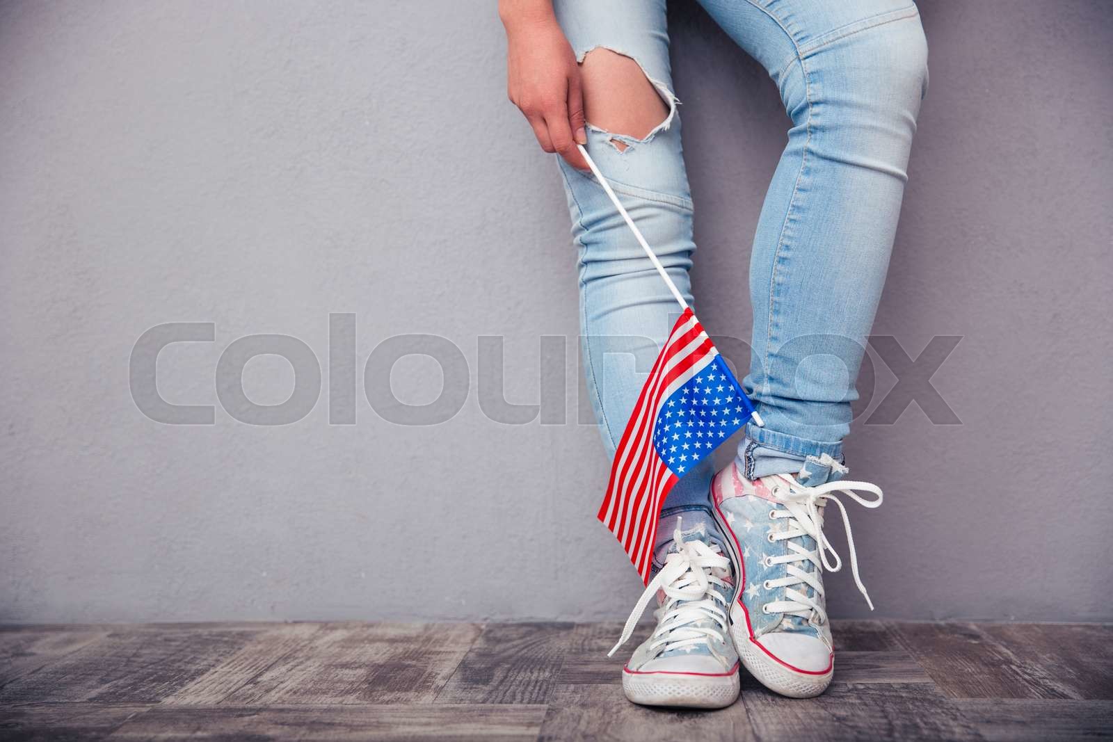 Female legs with USA flag | Stock image | Colourbox