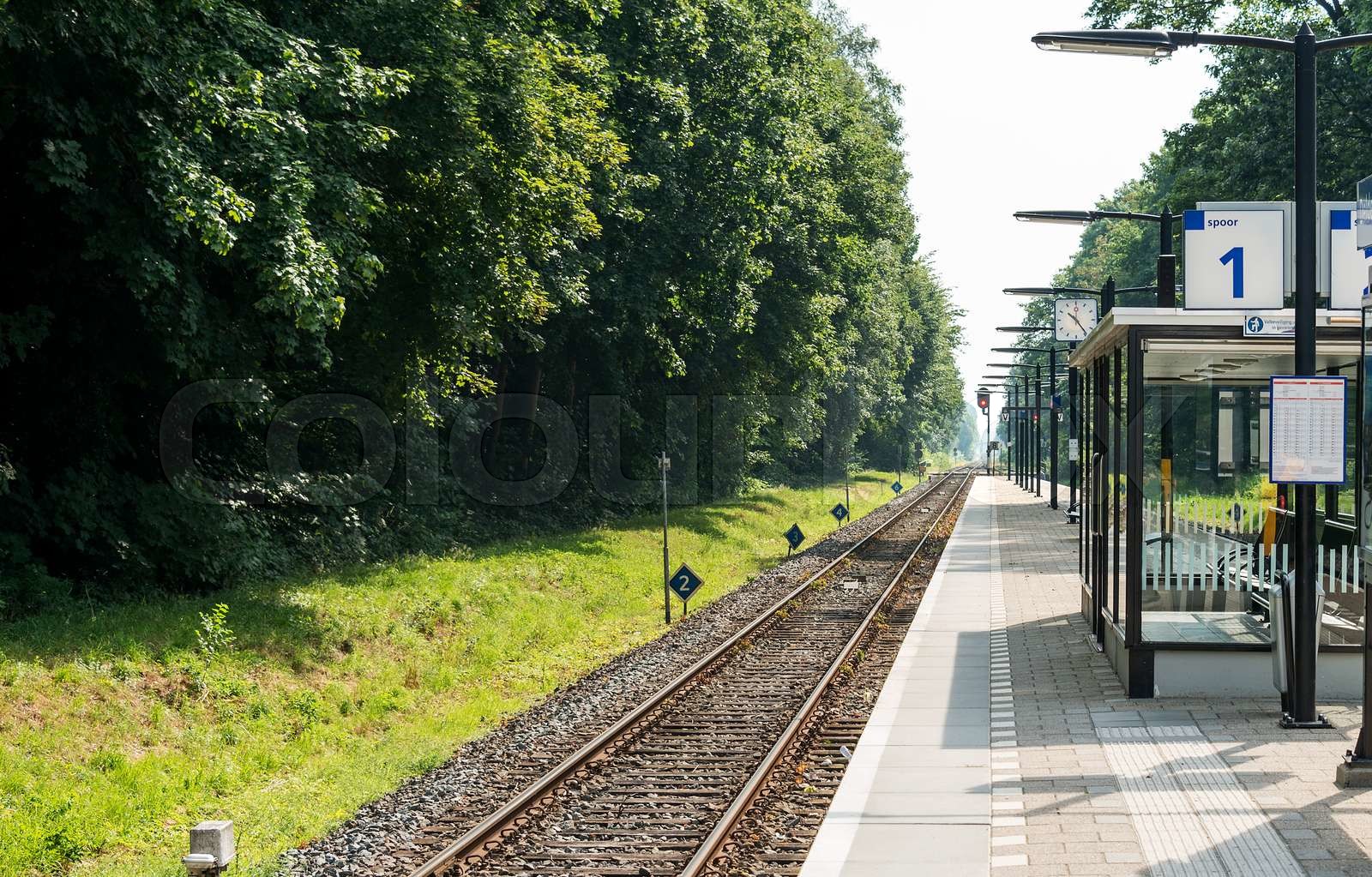 railroad track near train station | Stock image | Colourbox