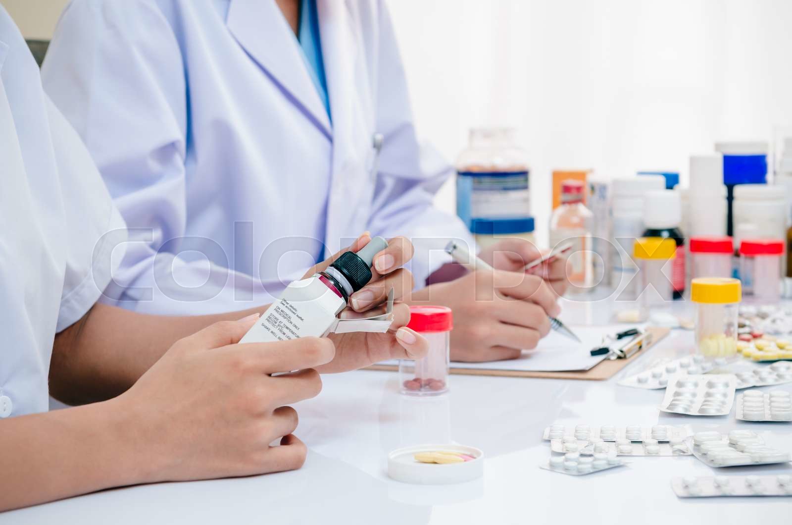 pharmacists working in office | Stock image | Colourbox