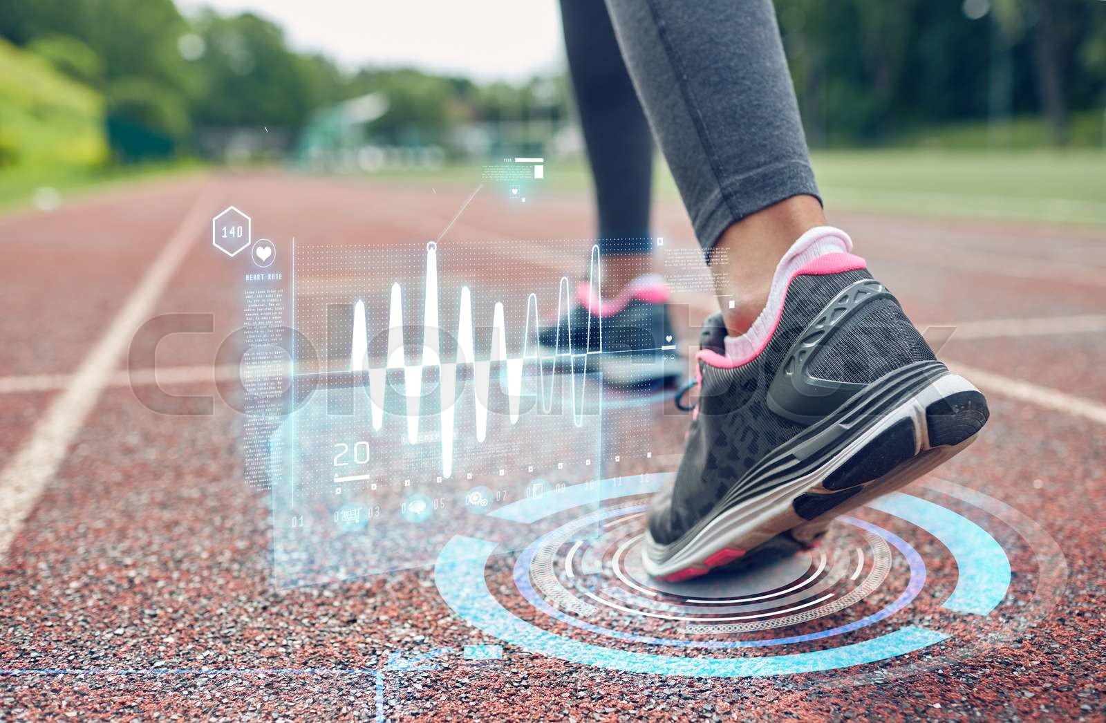 close up of woman feet running on track | Stock image | Colourbox