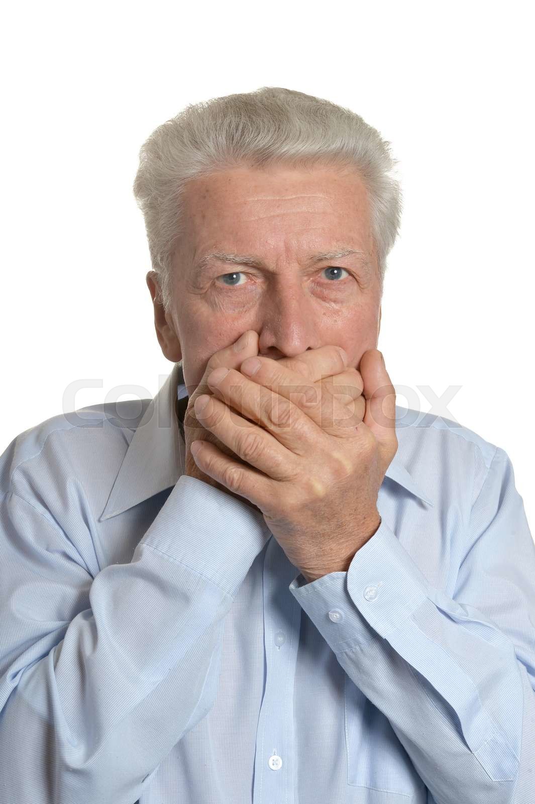 man scared and shut hands over her mouth | Stock image | Colourbox