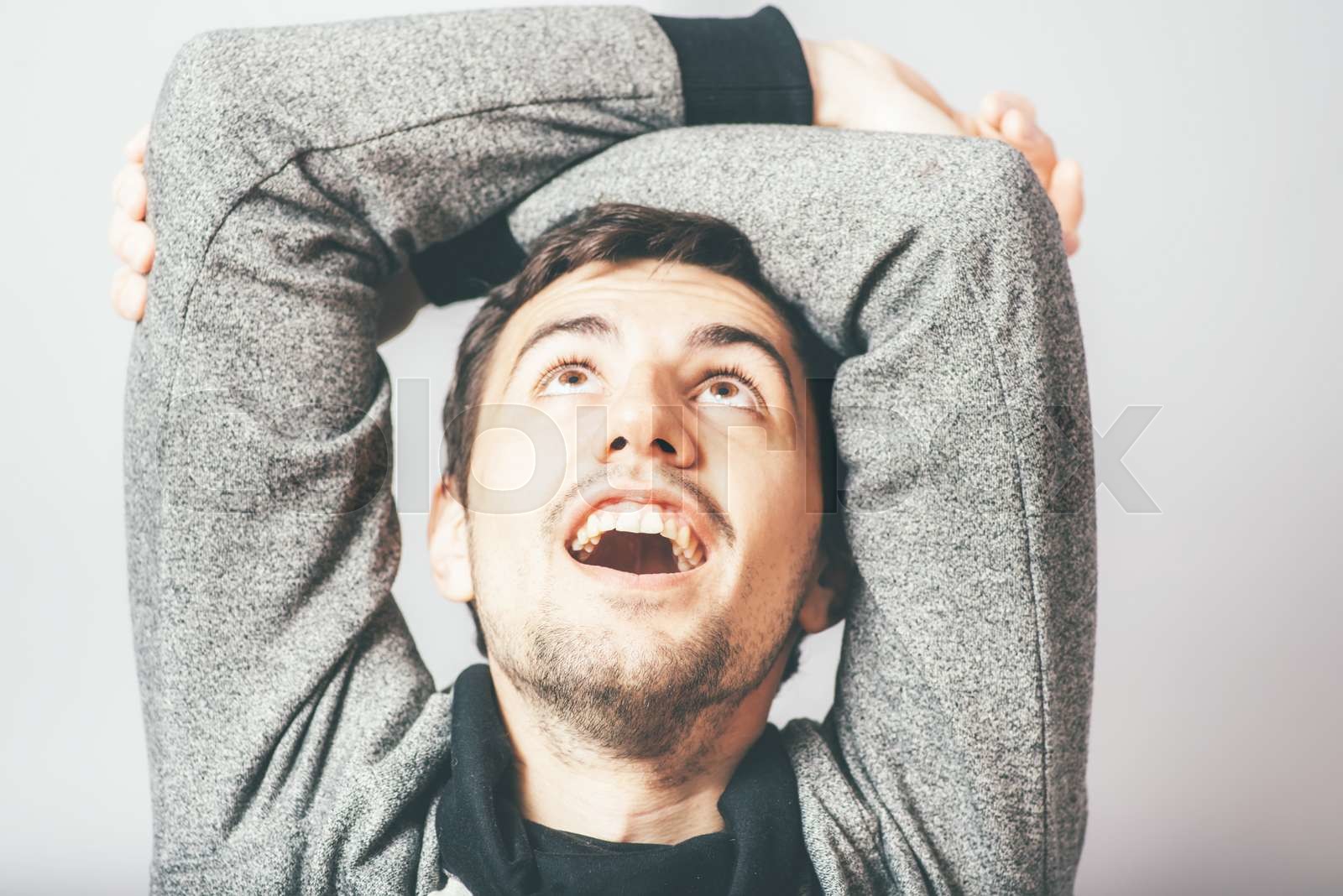 the man leaned back in his chair | Stock image | Colourbox