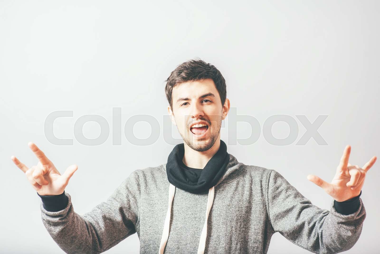 man shows what he is cool | Stock image | Colourbox