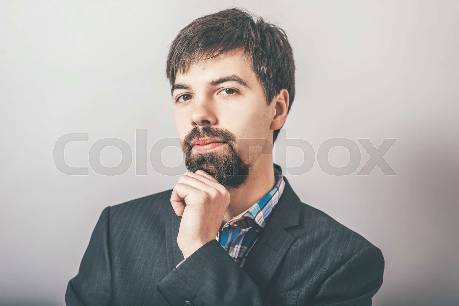 businessman with his chin fist | Stock image | Colourbox