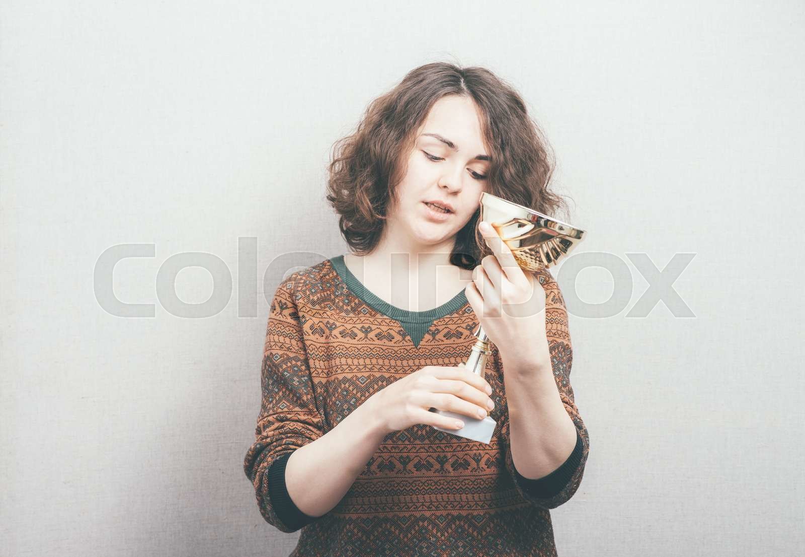 girl with a prize trophy | Stock image | Colourbox