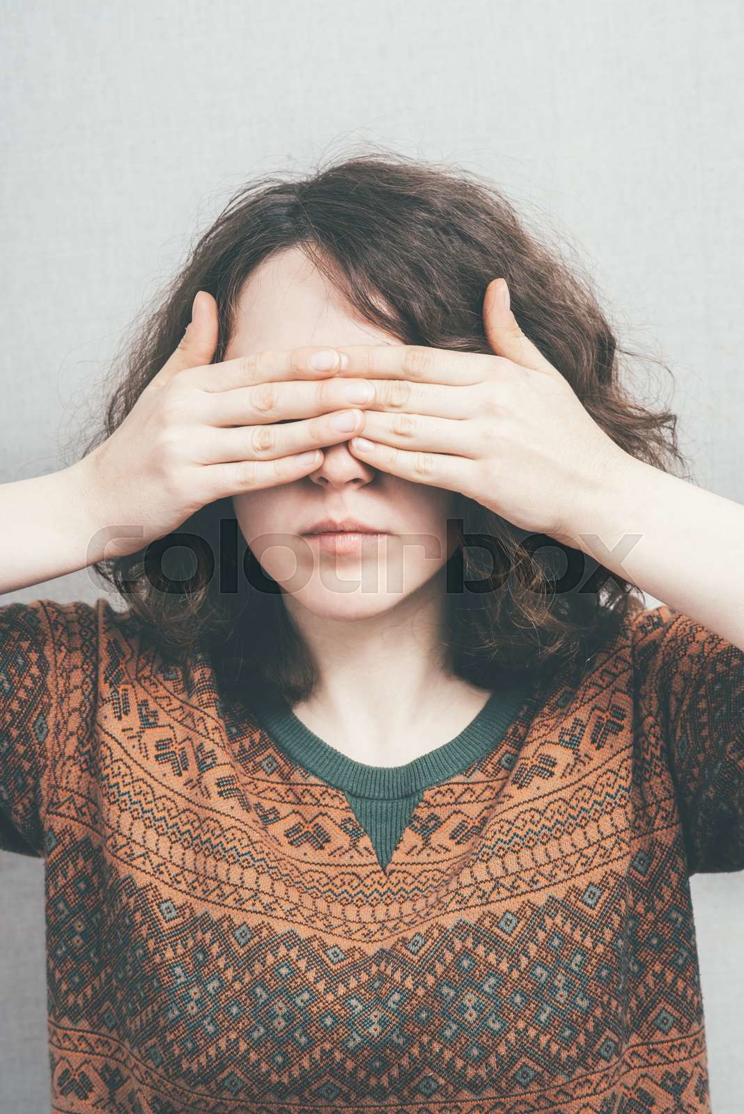 woman covering her eyes | Stock image | Colourbox