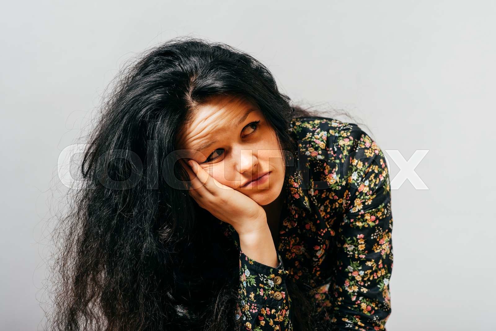 girl put her chin on her hand | Stock image | Colourbox