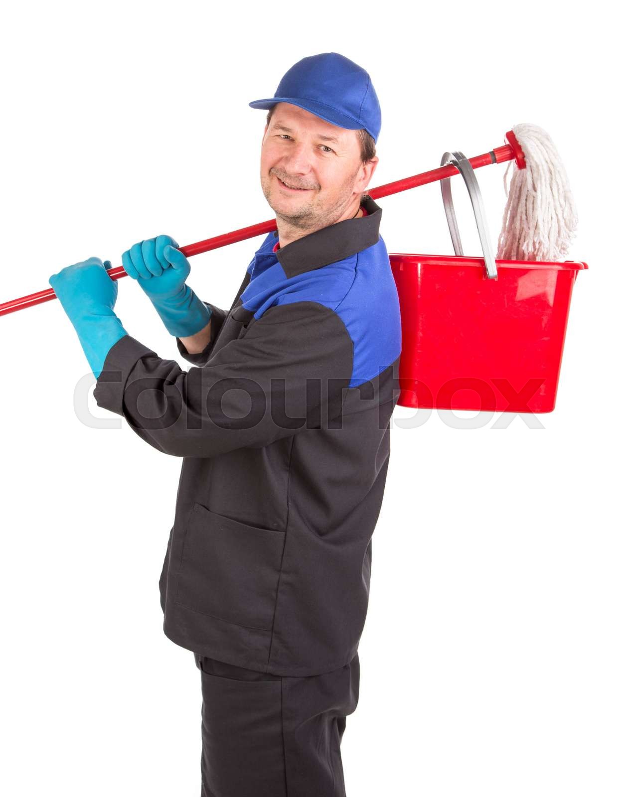 Man holding cleaning mop and bucket. | Stock image | Colourbox