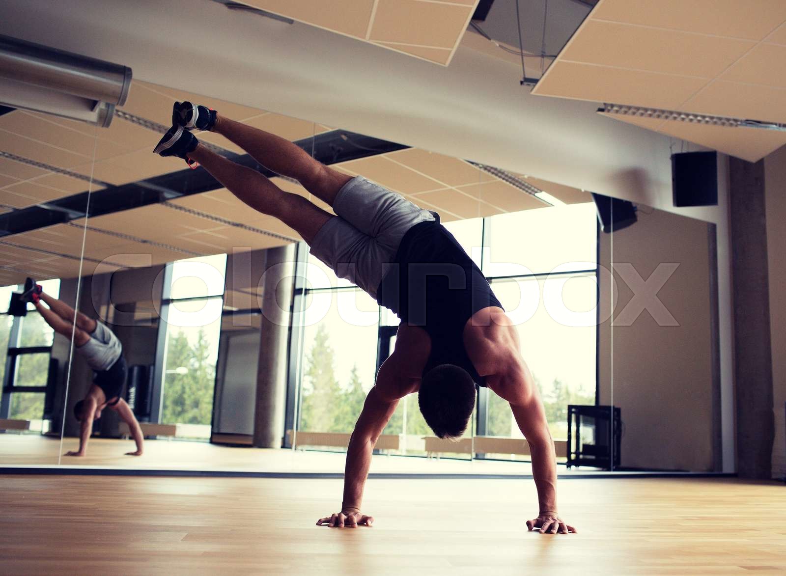man exercising in gym | Stock image | Colourbox