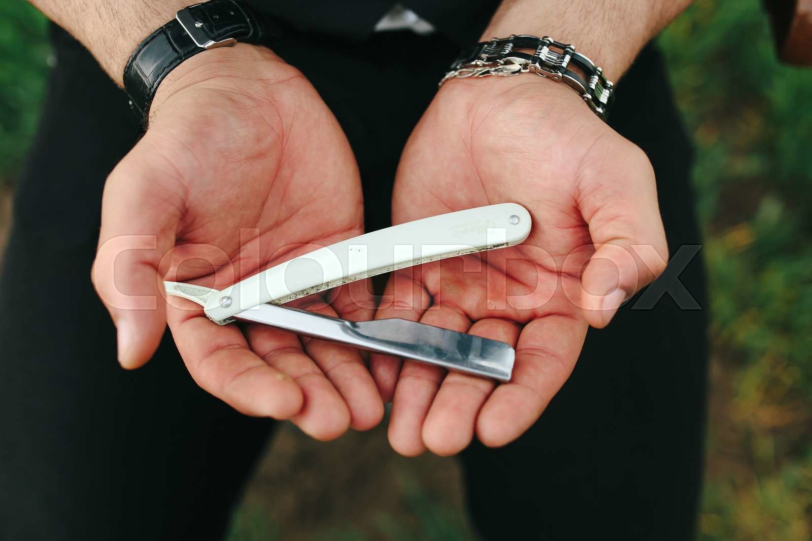 ancient blade in the hands of men | Stock image | Colourbox