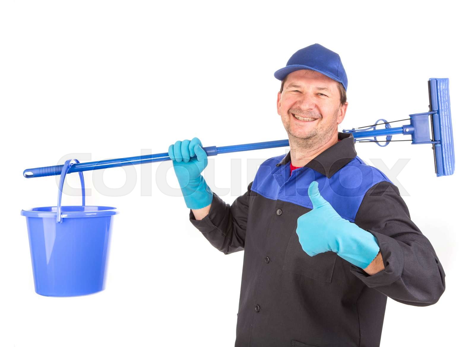 Man holding broom and bucket | Stock image | Colourbox