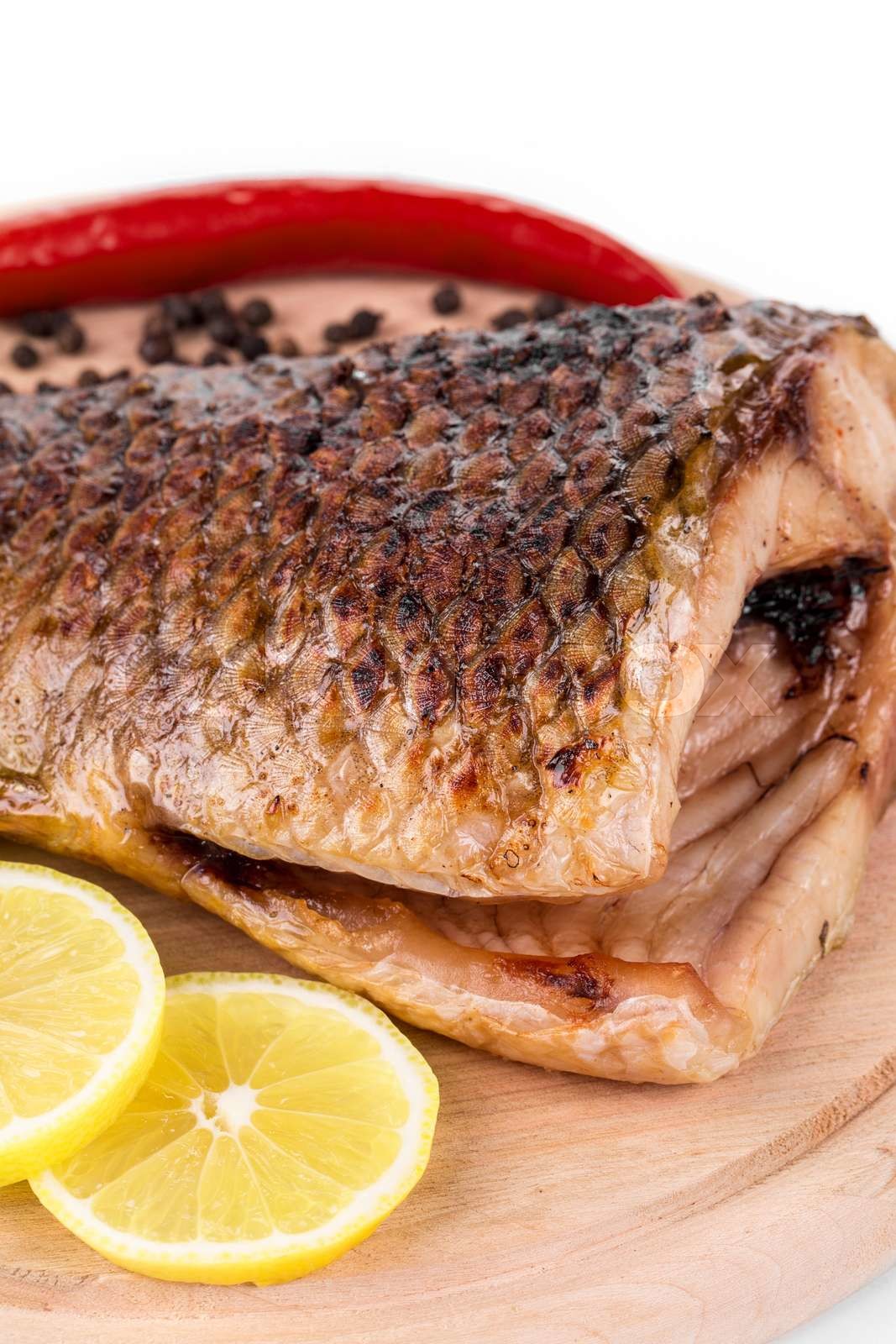 Close up of grilled carp steak. | Stock image | Colourbox