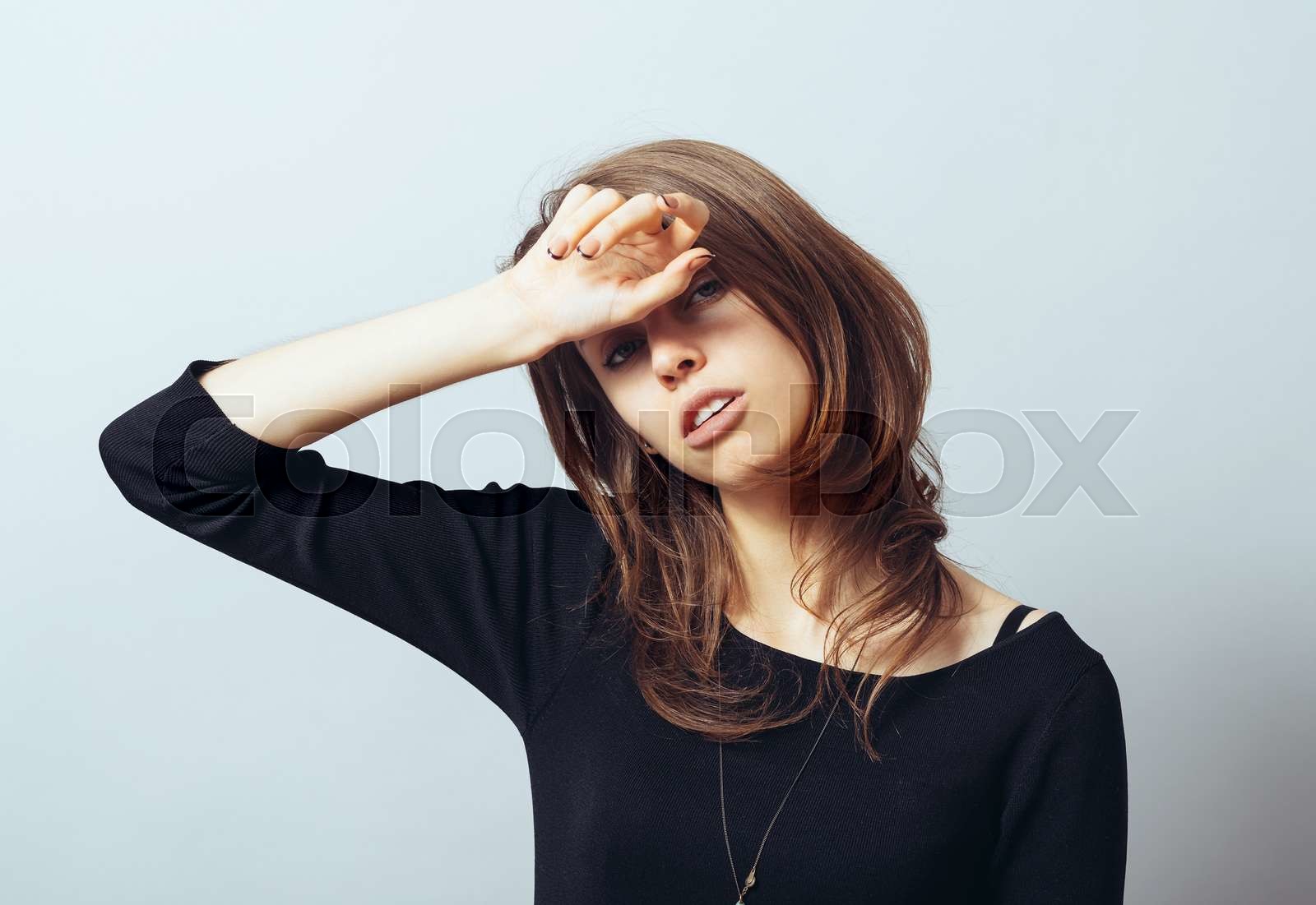 portrait of a young girl headache | Stock image | Colourbox