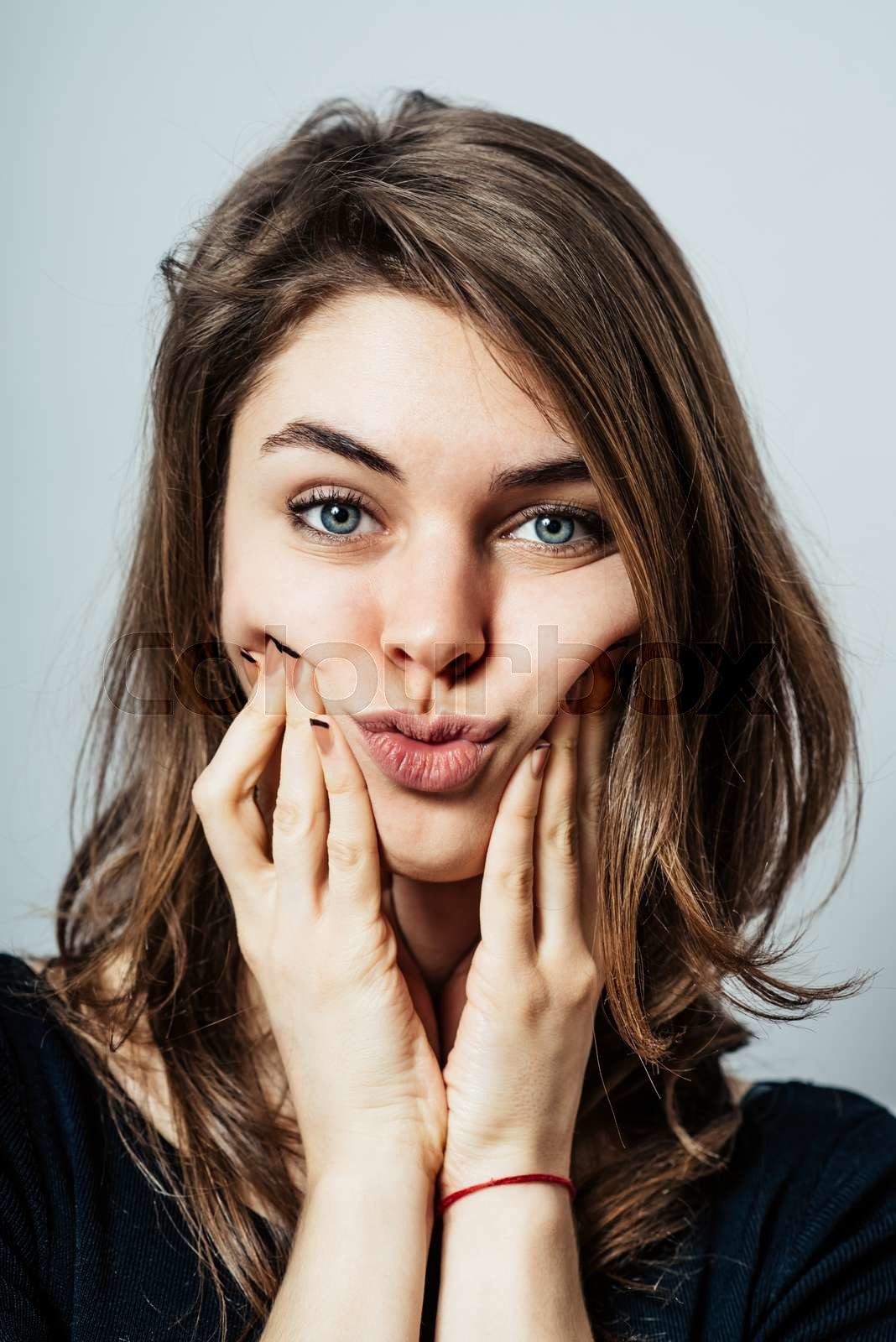 girl kisses | Stock image | Colourbox