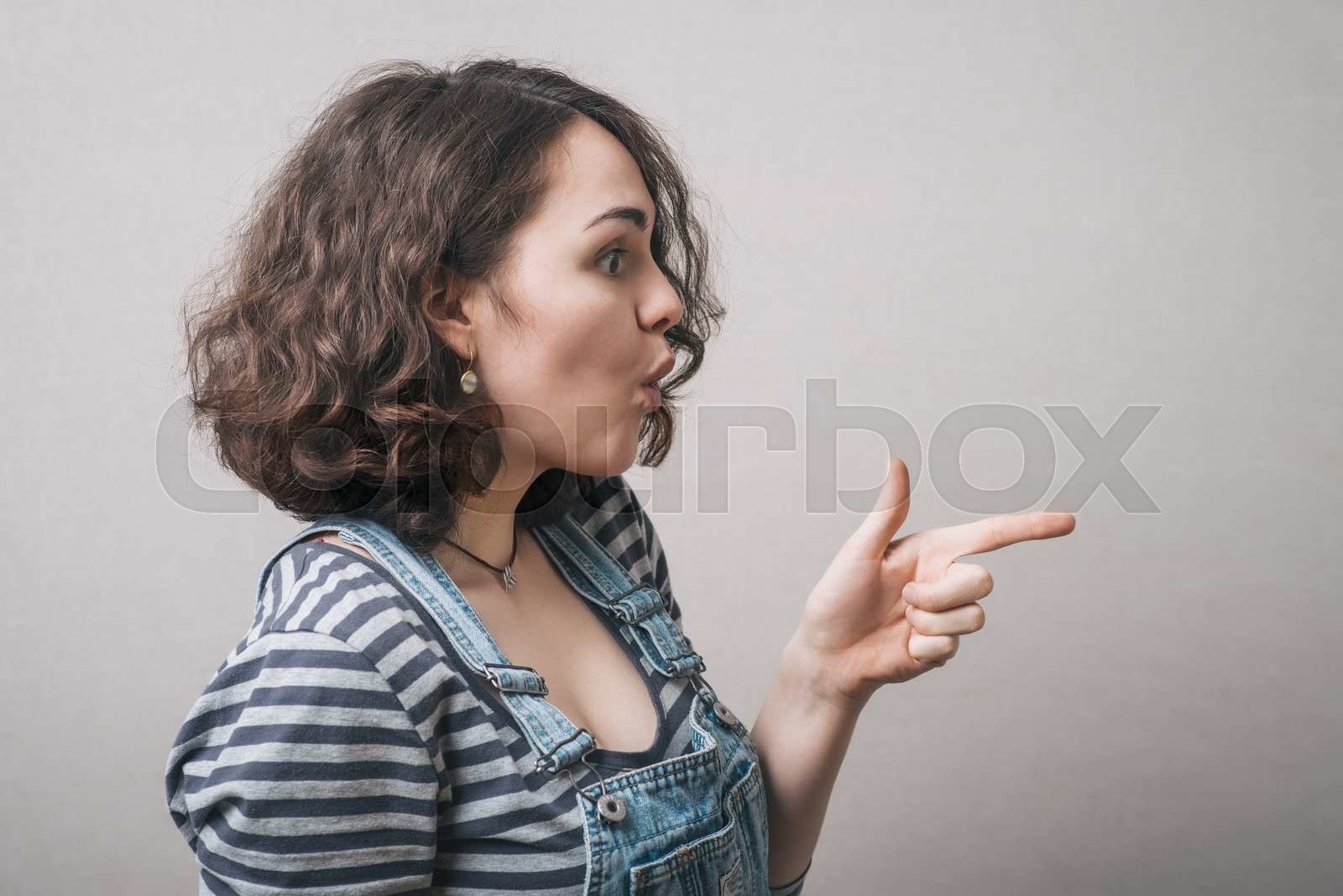 young girl shows a side | Stock image | Colourbox