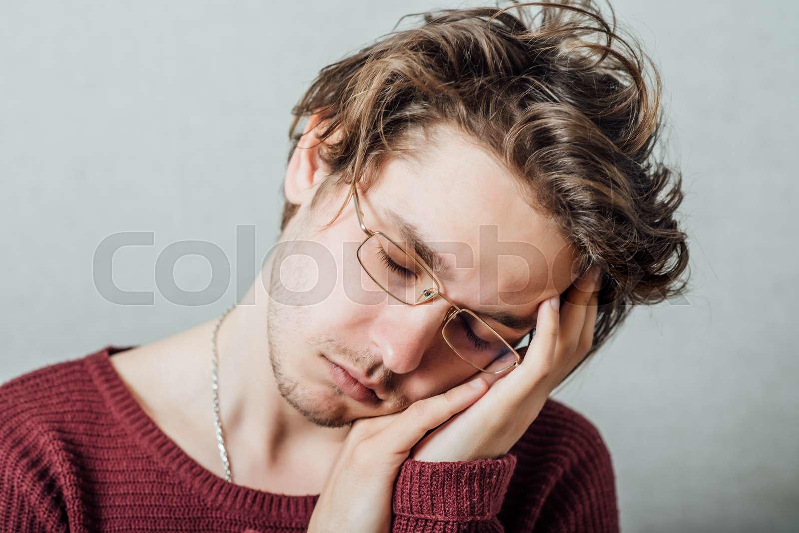 man was very tired at the office work | Stock image | Colourbox