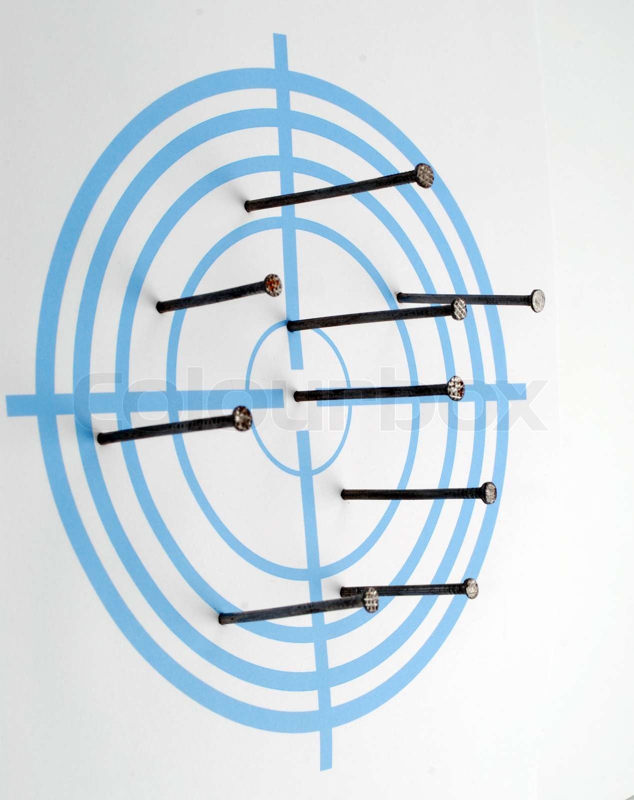 Dark blue target with concentric circles and nails | Stock image ...