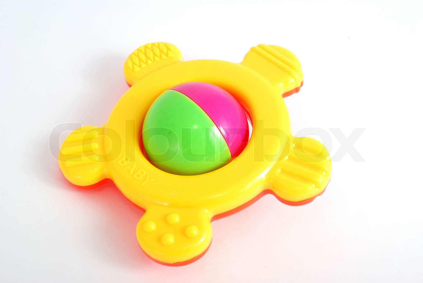 Kinder-Rassel aus Kunststoff auf einem weißen Hintergrund | Stock Bild ...
