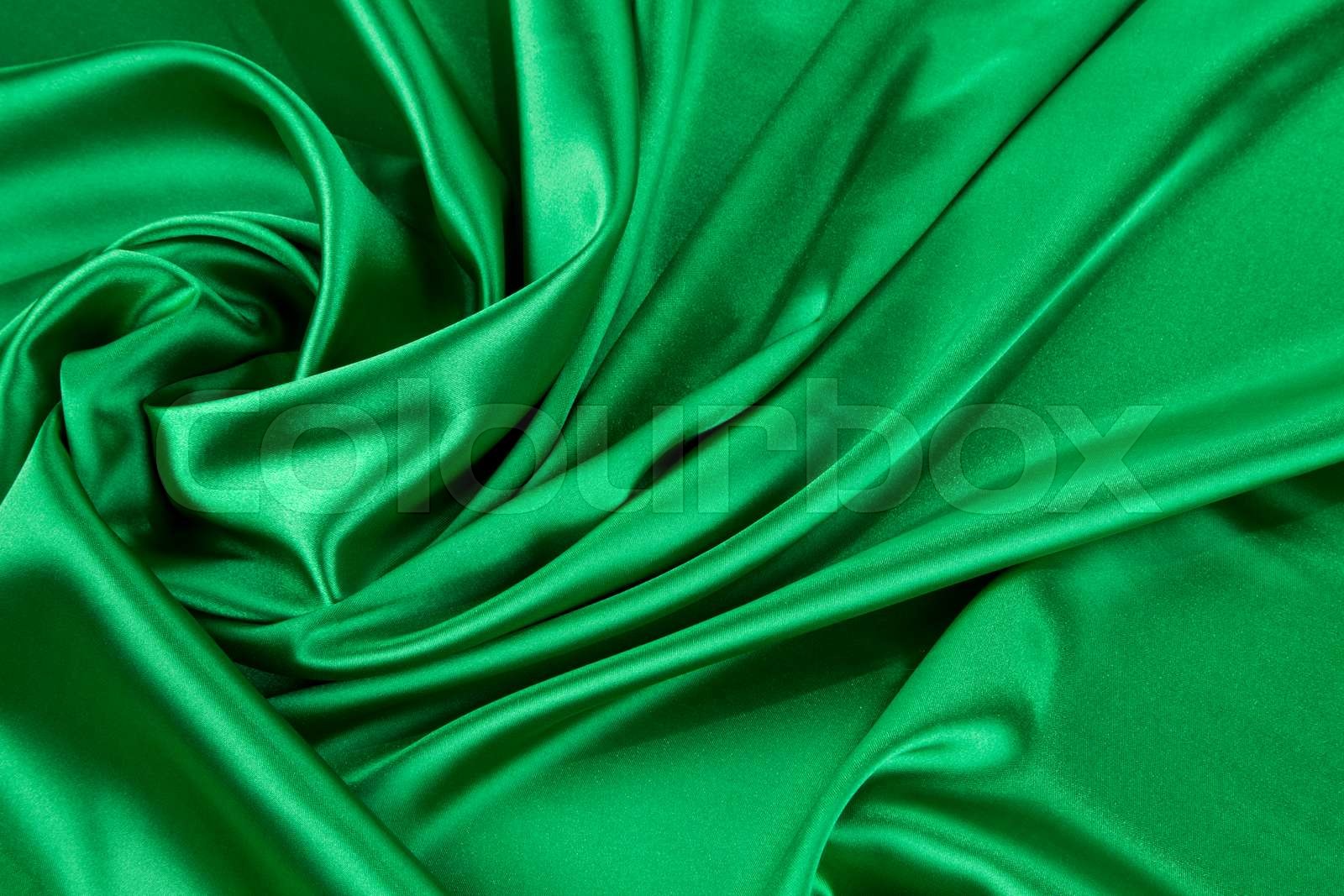 Green silk cloth with soft folds. | Stock image | Colourbox