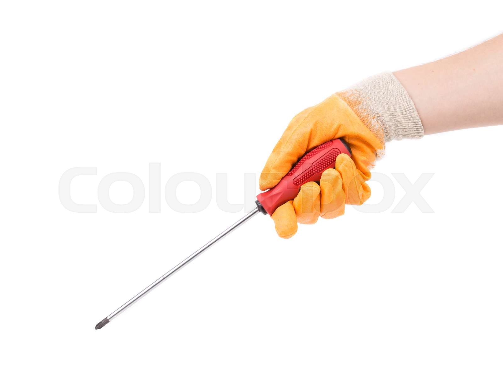 Hand in glove with screwdriver. | Stock image | Colourbox